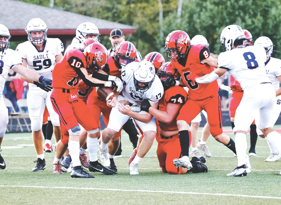 Marquette’s Dasan Smith all-state in football: Top MSHS lineman earns ...